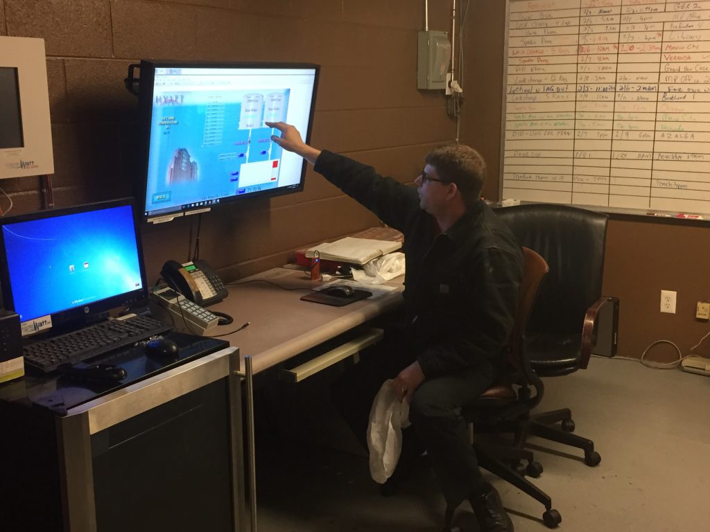 Simple hotel stormwater capture and reuse system benefits local ...